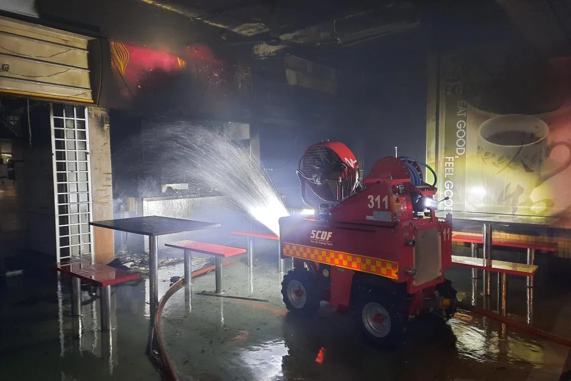 About 100 people evacuated after fire breaks out at Yishun coffee shop ...
