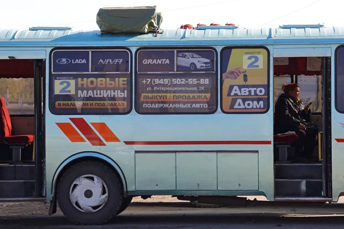 Russian-held town in eastern Ukraine equips buses with drone jammers ...