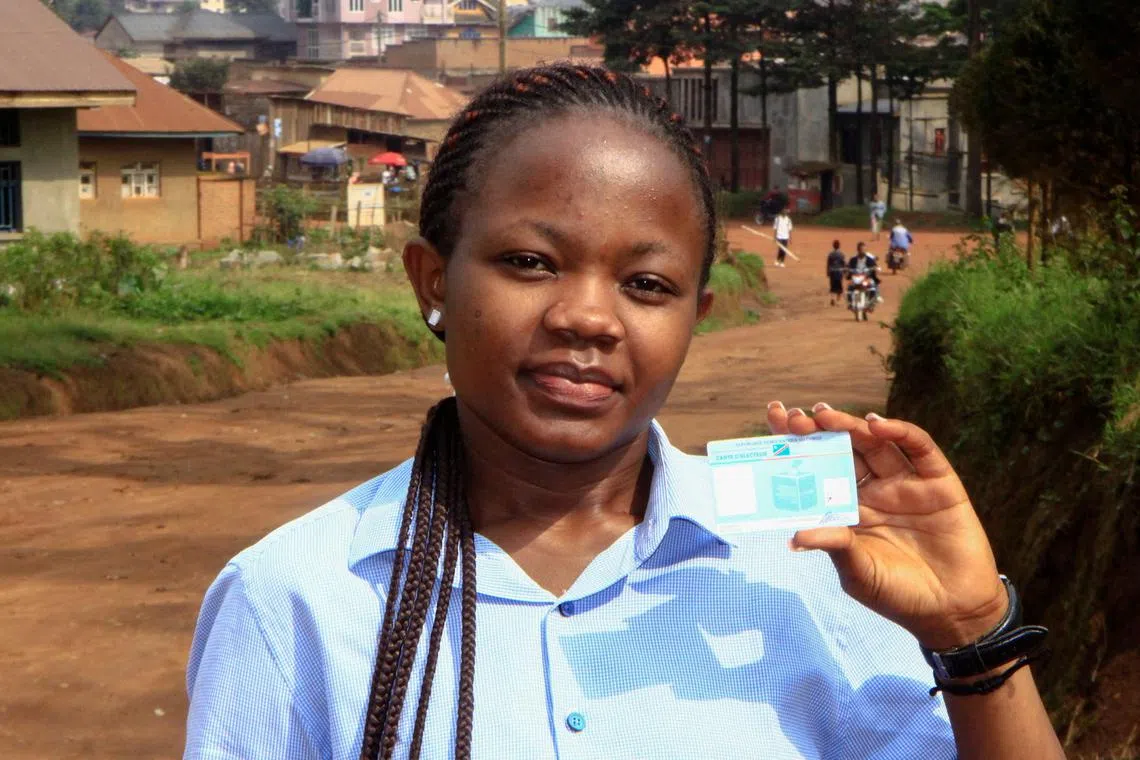 Smudged ID cards, missing names blemish Congo's $1 billion election ...