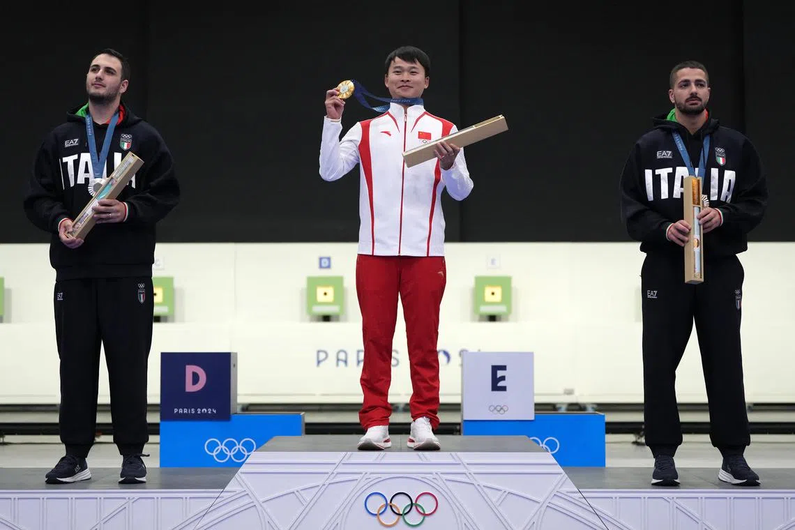 Shooting-China's Xie shoots gold in dream debut | The Straits Times