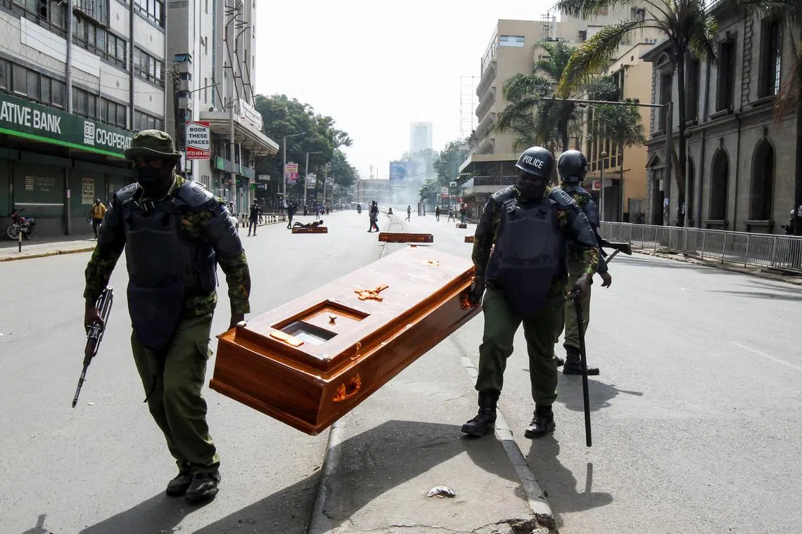 Tear gas, stones and flames as Kenya protesters say 'Ruto must go ...