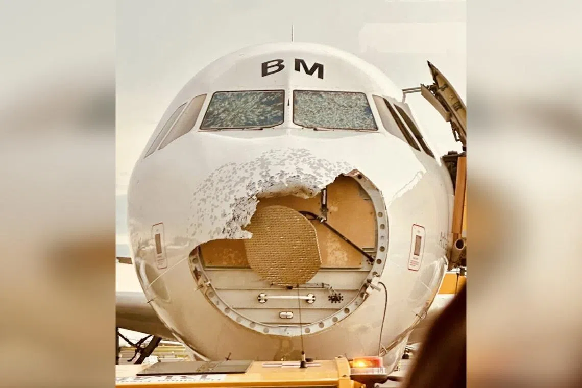Austrian flight lands safely after hailstones rip away nose cone | The ...