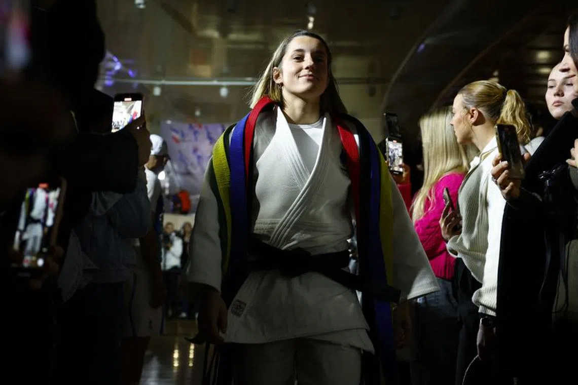 ‘Chic, elegant, bright’ – French athletes parade kit for 2024 Paris ...