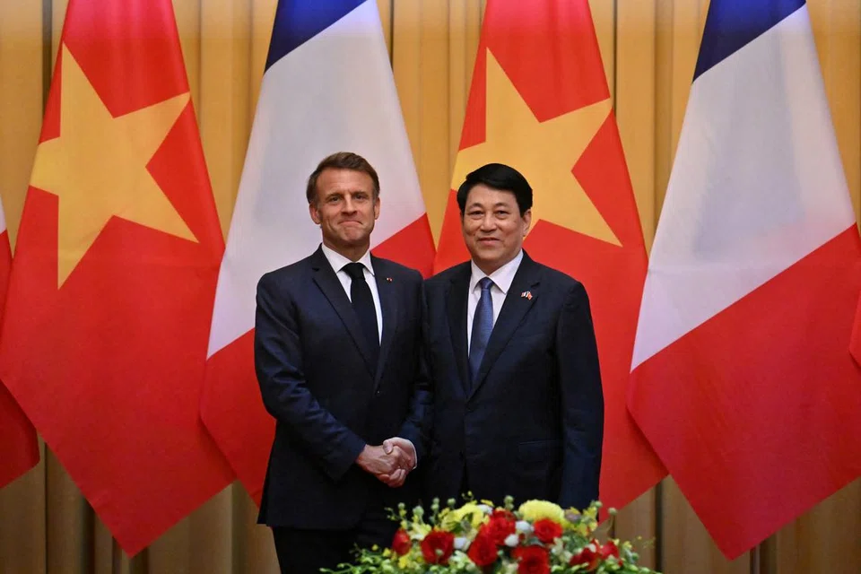 France, Vietnam sign Airbus, satellite deals as Macron visits Hanoi ...