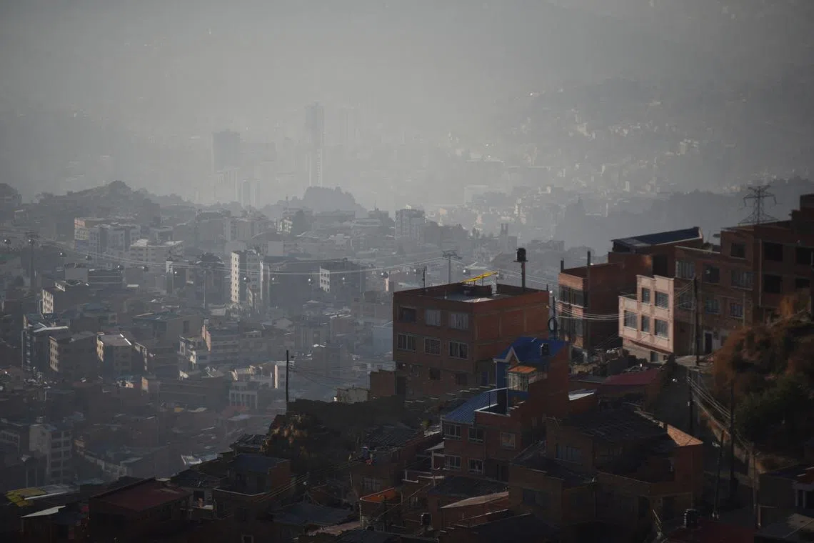 As Bolivia wildfires rage, smoke turns day into night | The Straits Times