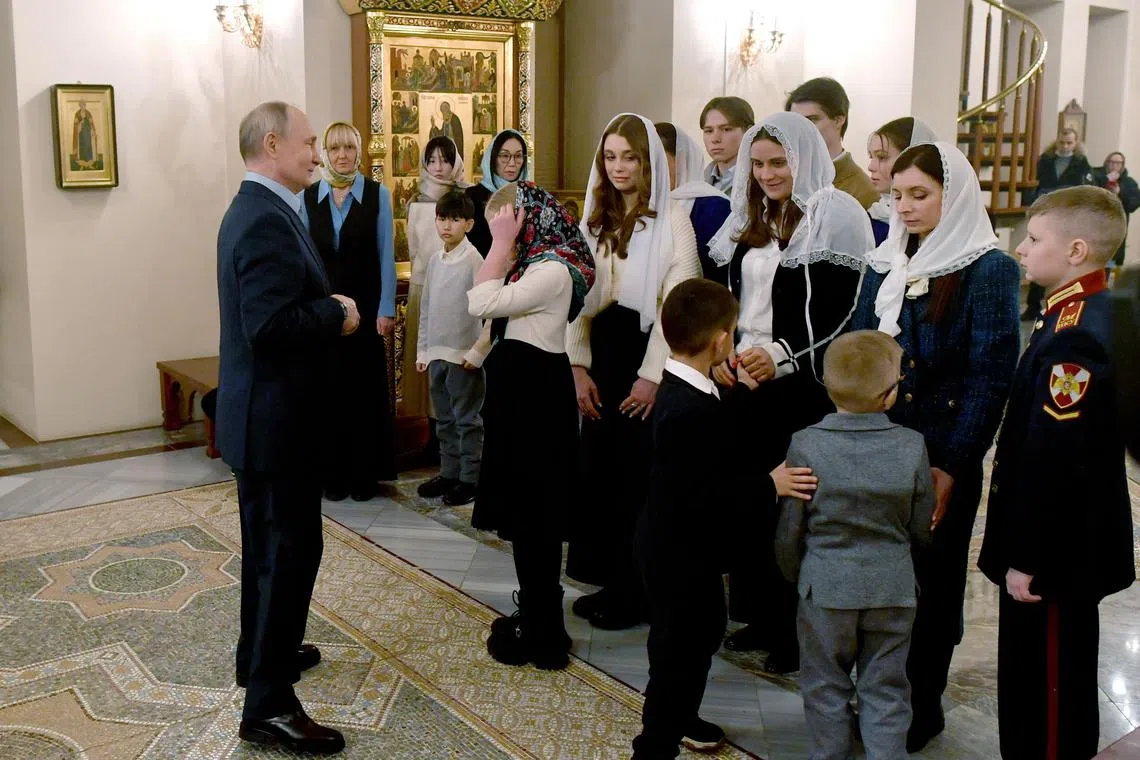 On Orthodox Christmas, Putin vows to back soldiers who ‘defend’ Russia | The Straits Times
