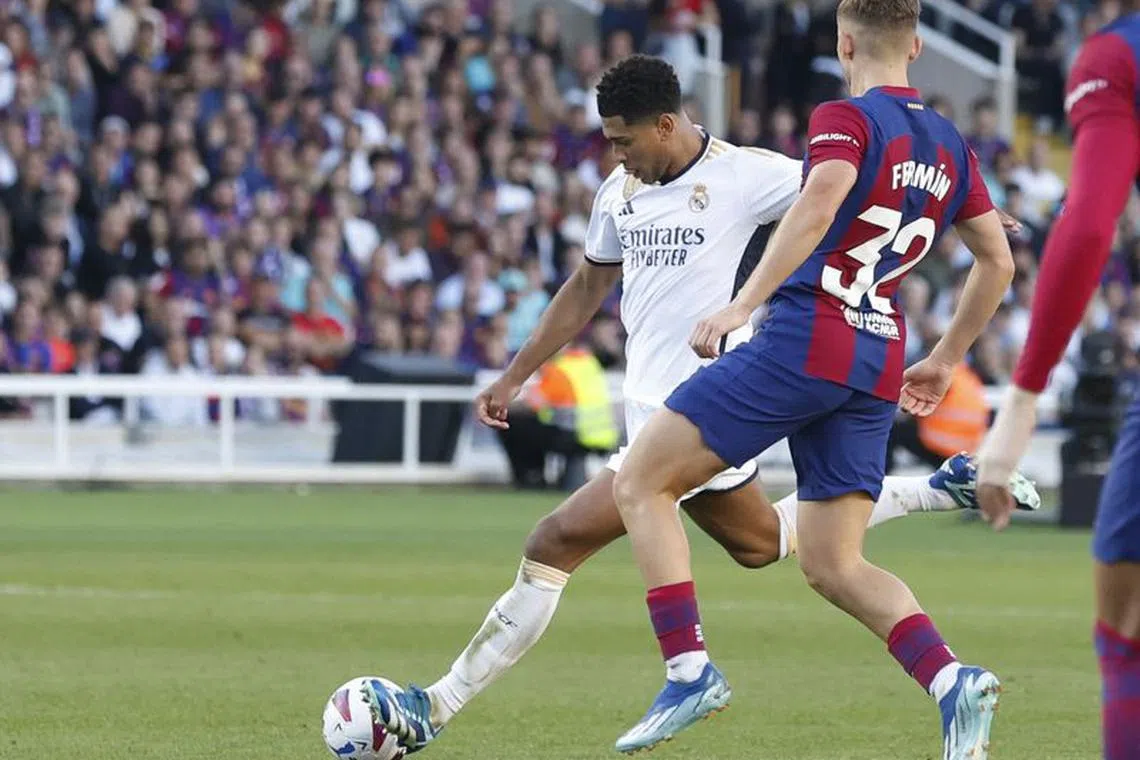 Bellingham double allows Real to fight back and win Clasico at ...