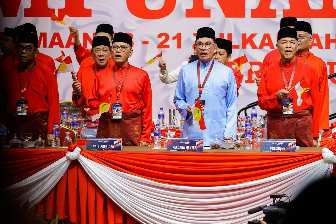 PM Anwar back at Umno assembly after 25 years, as Zahid repeats calls ...