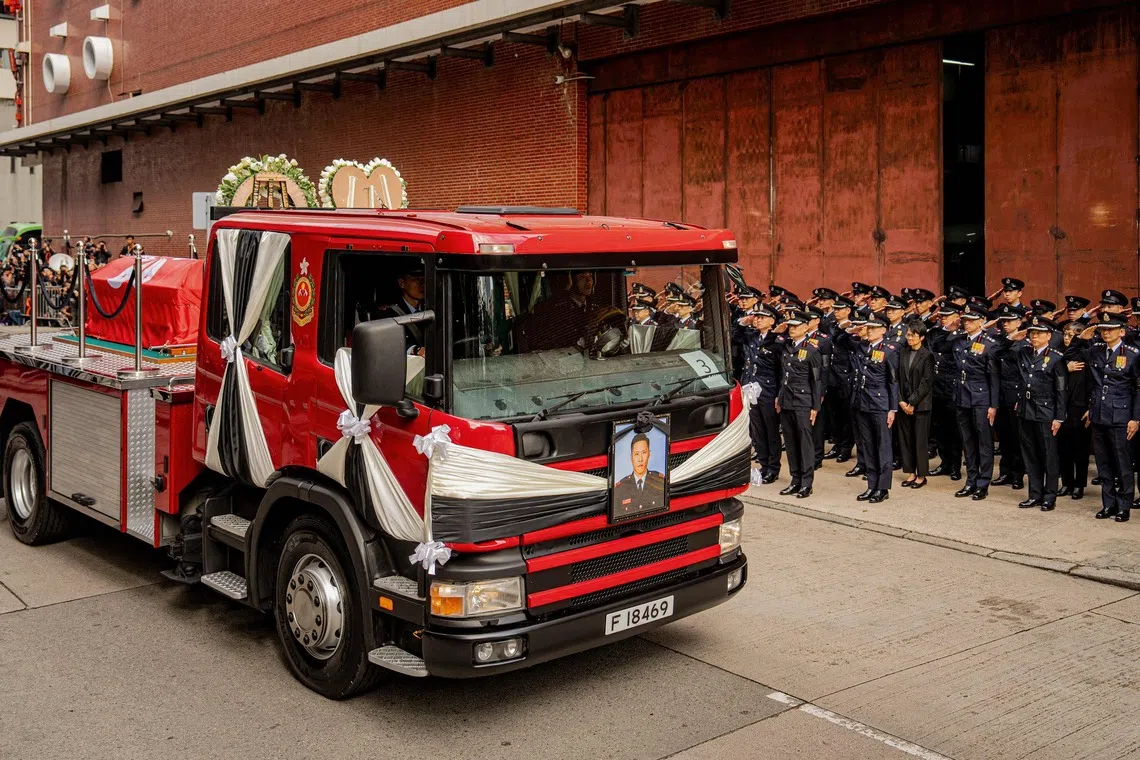 Tears at tribute to firefighter killed in Hong Kong blaze | The Straits ...
