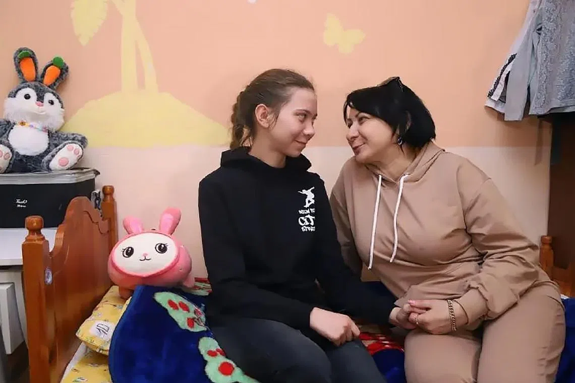 Russian girl who drew anti-war picture leaves orphanage with mother ...