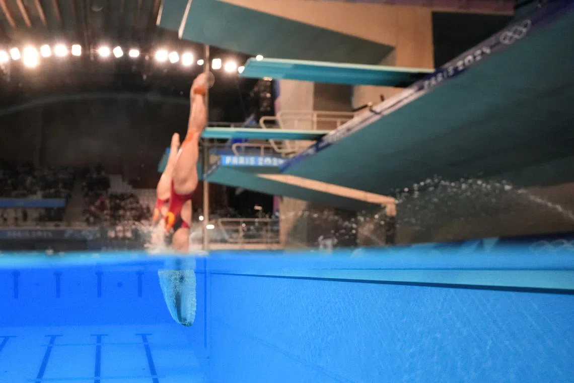 Diving-Chinese gold winning duo nearly missed their moment amid crowd ...