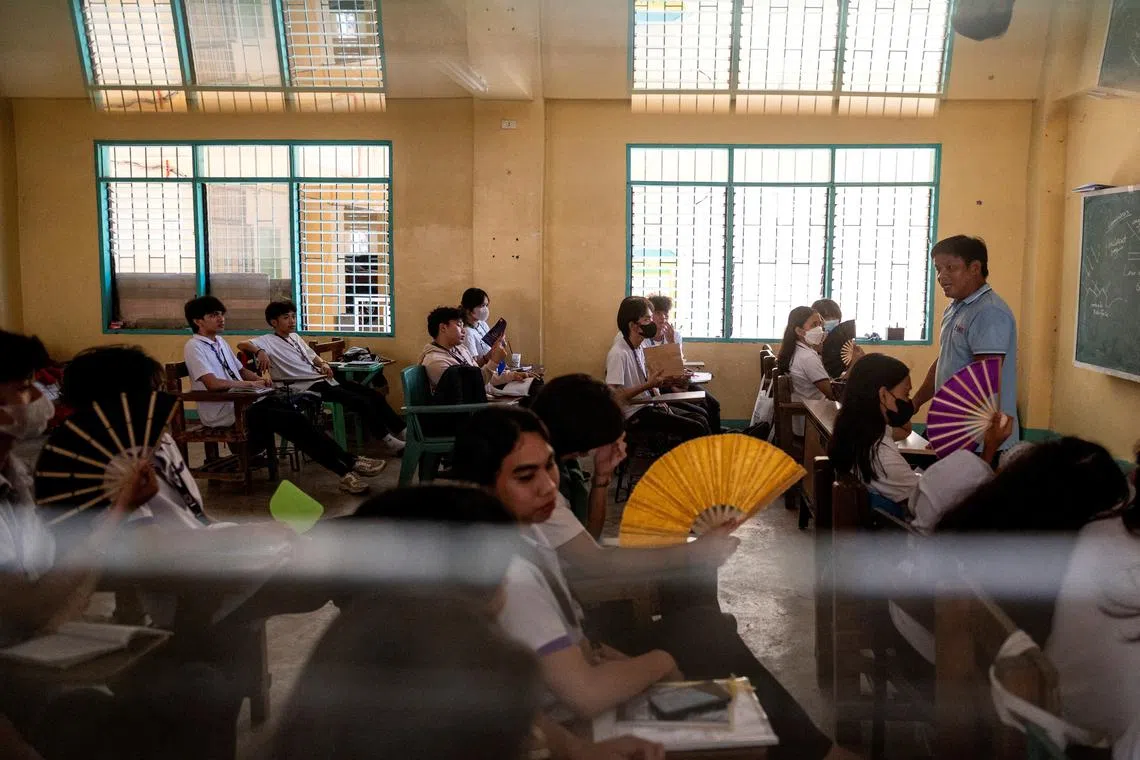 Heat in Philippines spurs shift to online classes, prospect of power crunch | The Straits Times
