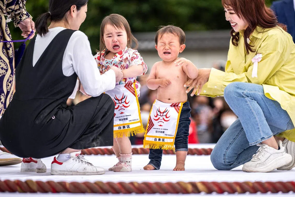 Japan’s ‘crying baby sumo’ festival returns after pandemic | The ...