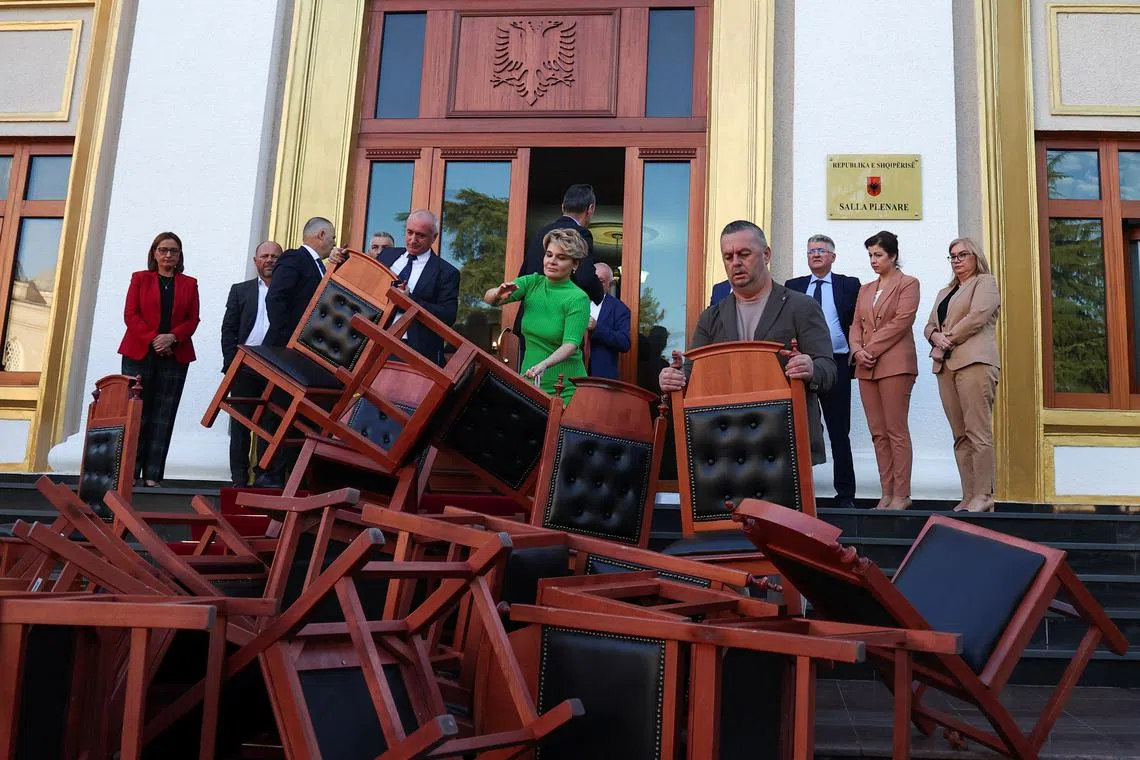 Albanian opposition protests jailing by setting chairs on fire outside ...