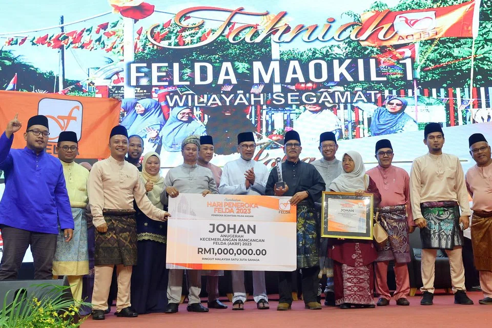 Malaysian govt writes off $2.4b of Felda settlers’ debts, with eye on ...