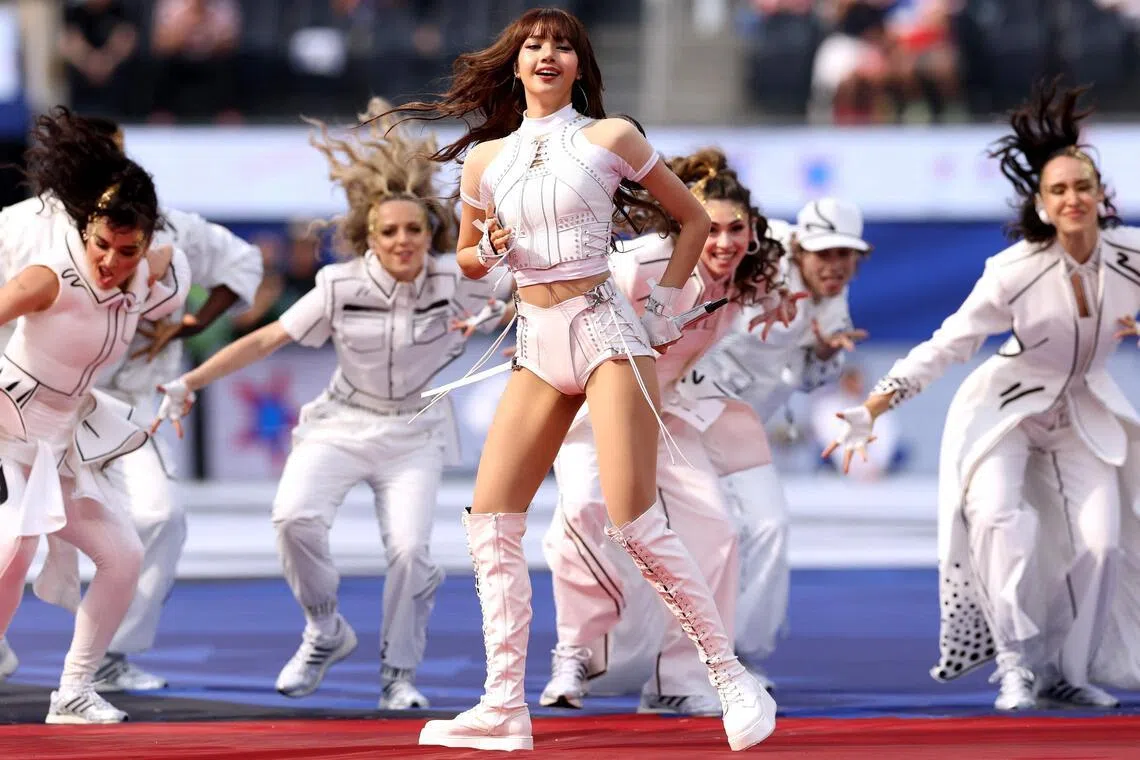 Performances by Katy Perry and Lisa, celebs like Tom Cruise bring glitz ...