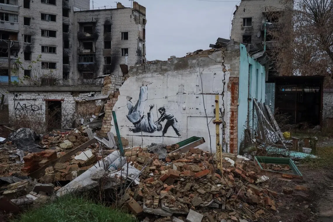 Banksy unveils mural in Ukraine town bombed by Russia | The Straits Times