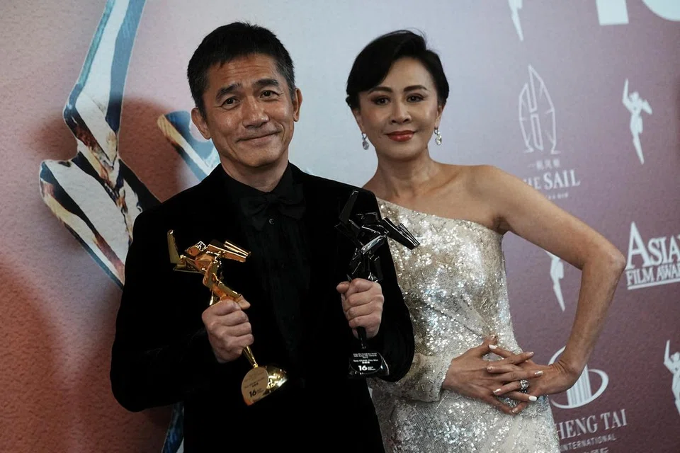 Tony Leung wins best actor at Asian Film Awards with wife Carina Lau ...