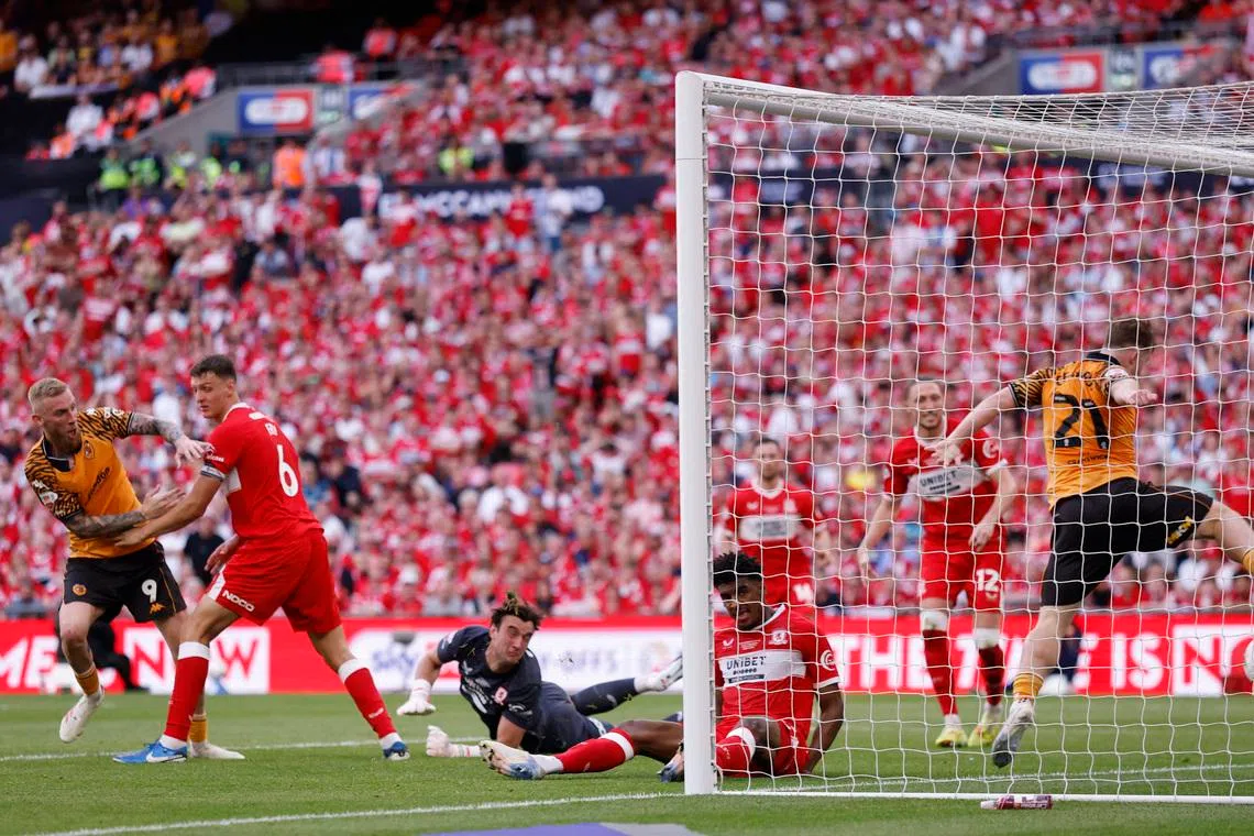 Hull back in Premier League after McBurnie's last-gasp playoff winner ...