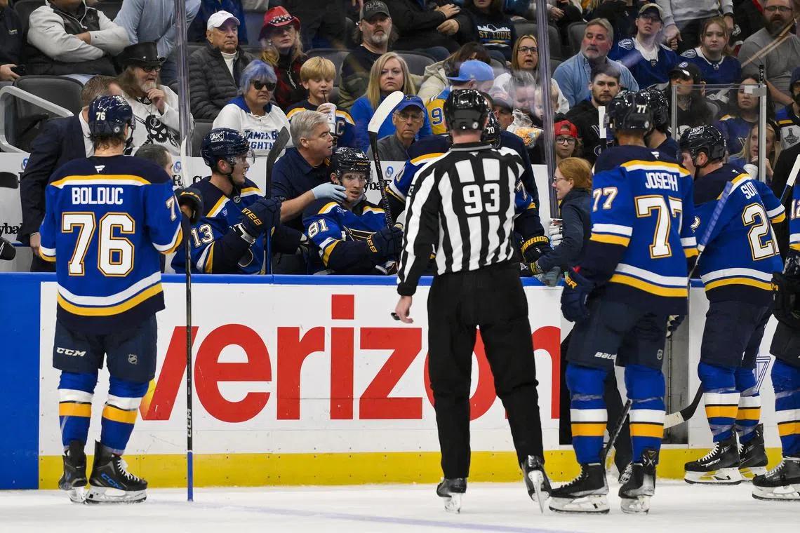 Blues F Dylan Holloway takes puck to neck, hospitalized | The Straits Times