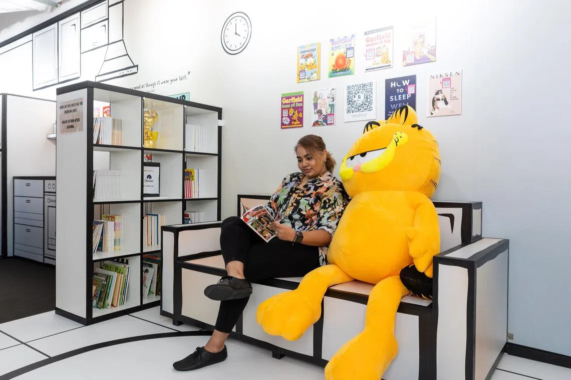 NLB launches Garfield-Mr Kiasu pop-up comic library at Centrepoint ...