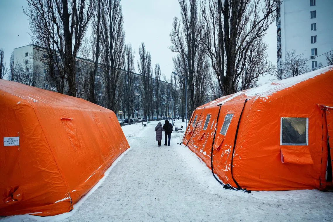 Ukraine's two largest cities under Russian attack, officials say 13 ...