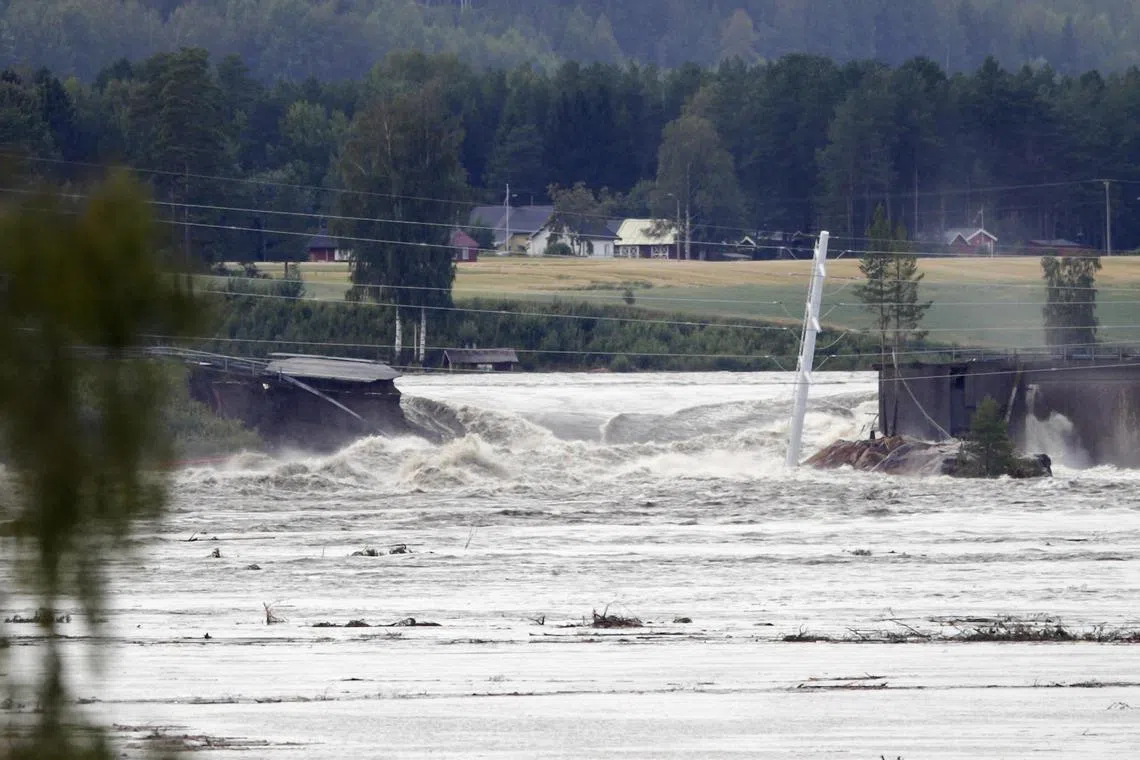 Norway river dam partly collapses after floods | The Straits Times