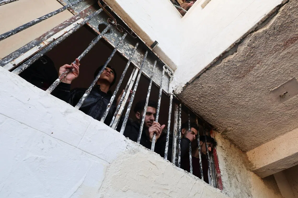 Despairing Syrians search notorious Sednaya prison for missing ...