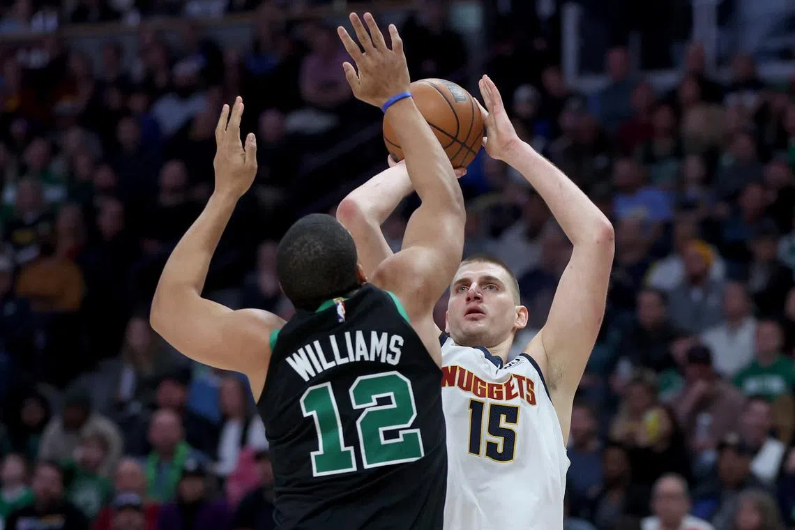 Basketball: Jokic triple-double leads Denver over Boston in NBA ...