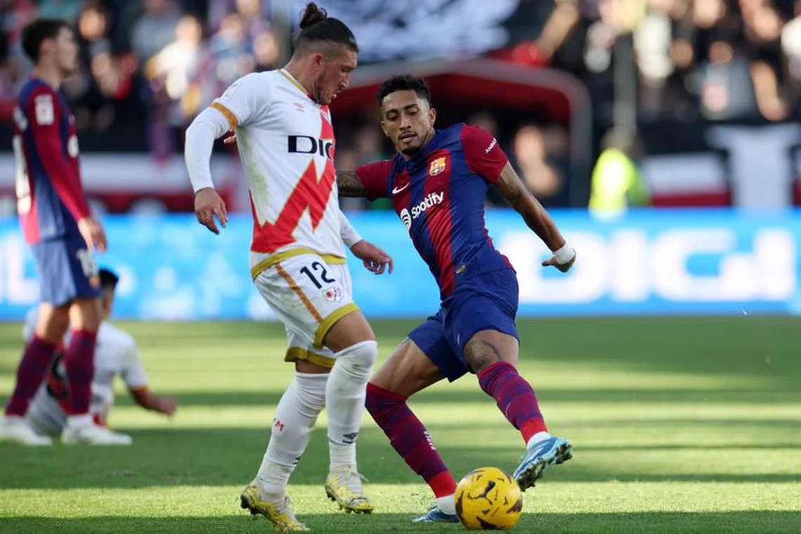 Barcelona fight back to draw at Rayo Vallecano | The Straits Times