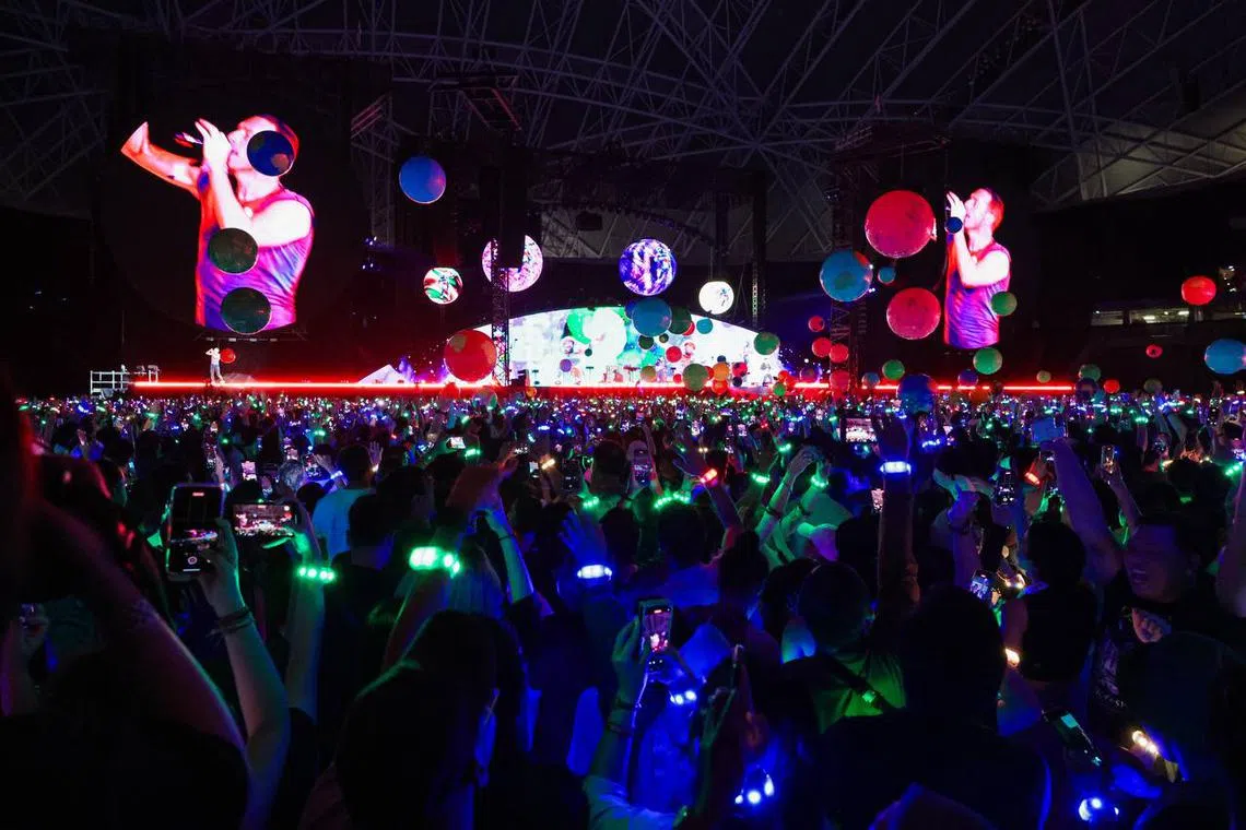 British band Coldplay light up National Stadium with kaleidoscopic ...