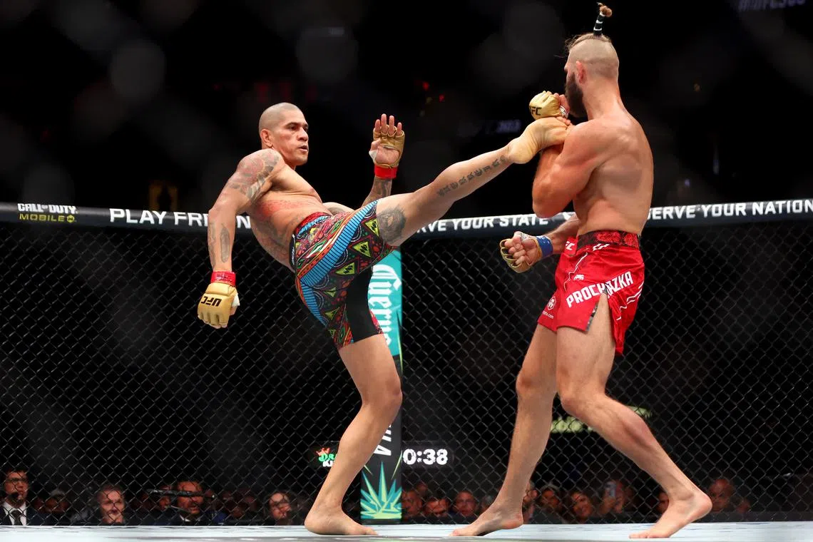 Mixed Martial Arts-Pereira retains UFC title, sets sights on ...