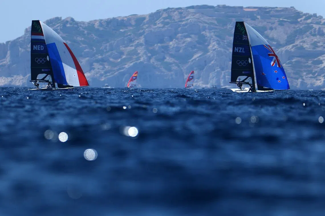 Sailing-Wilson and Morris guarantee Britain and Australia medals in ...