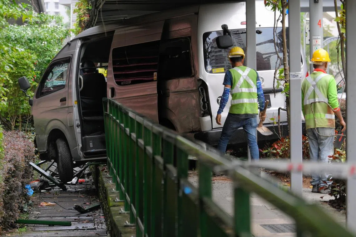 Driver, 72, dies after van crashes into covered walkway near Redhill ...