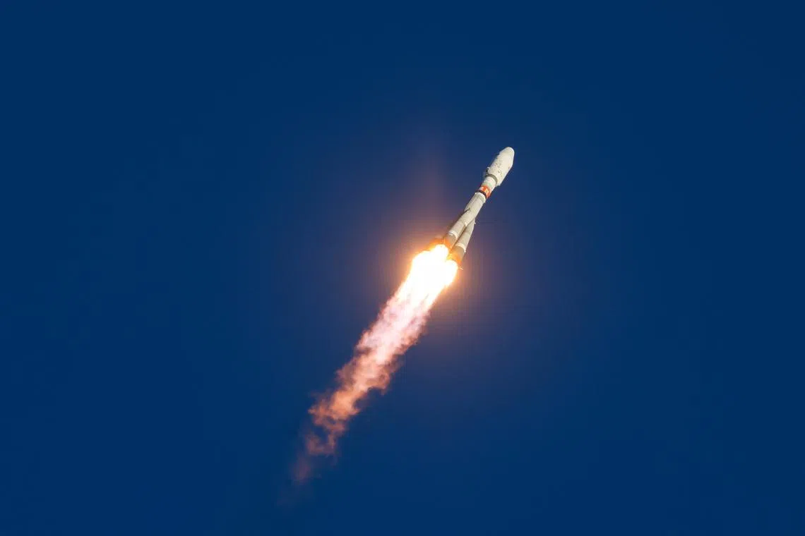 Russia launches Soyuz rocket with dozens of satellites, including two ...
