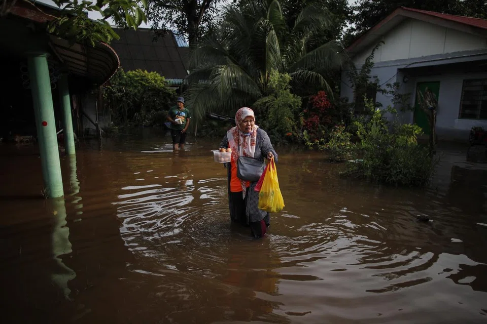 Thousands evacuated as flash floods inundate parts of Malaysia | The ...