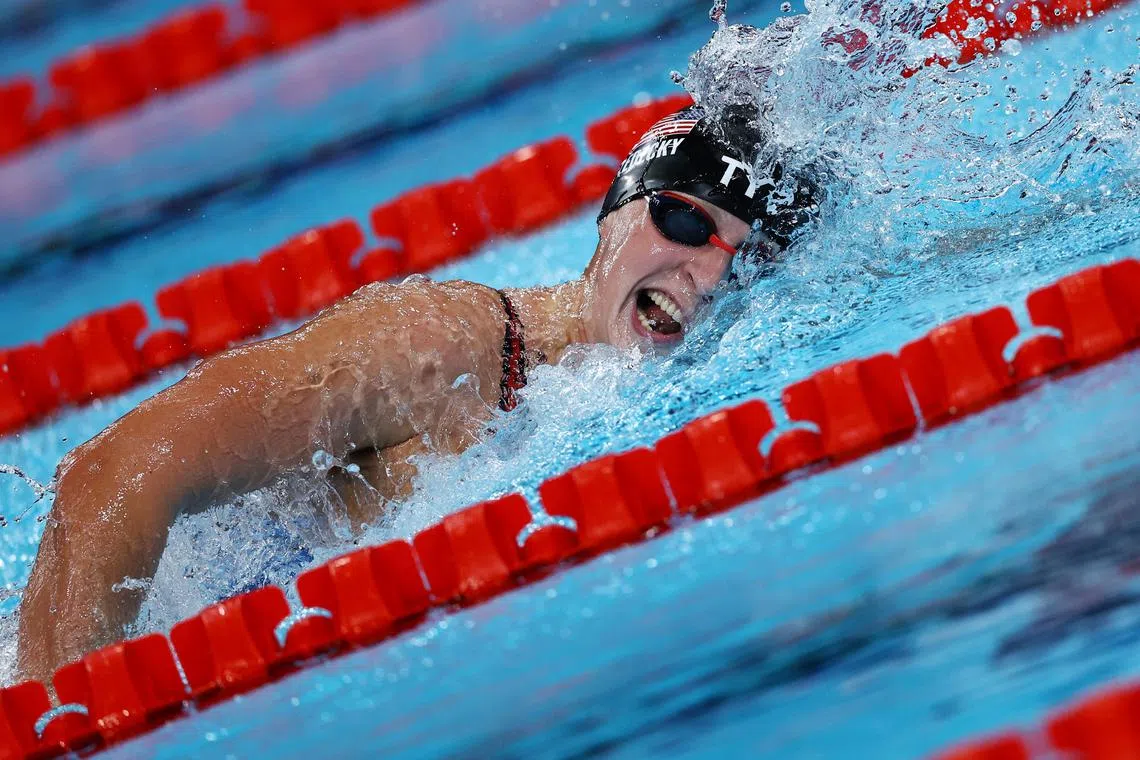 Swimming-Ledecky retains 1,500m freestyle title, re-writes record books ...