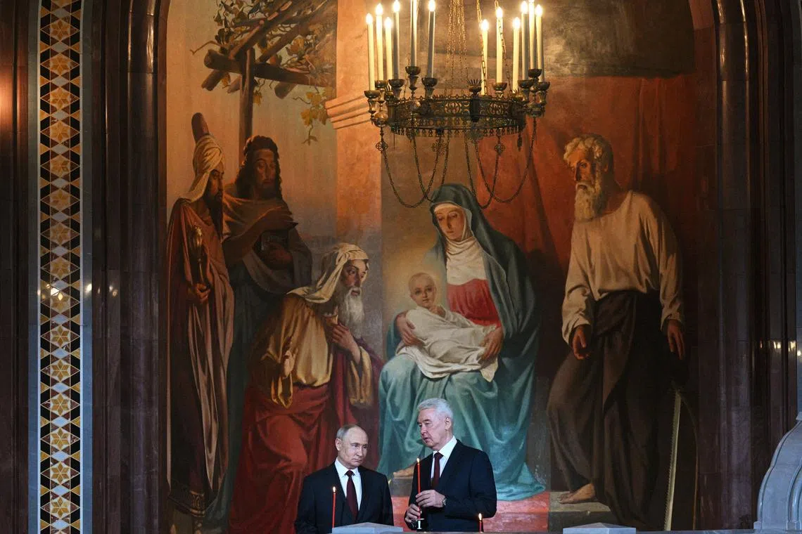 Putin attends Orthodox Easter service after declaring ceasefire in ...