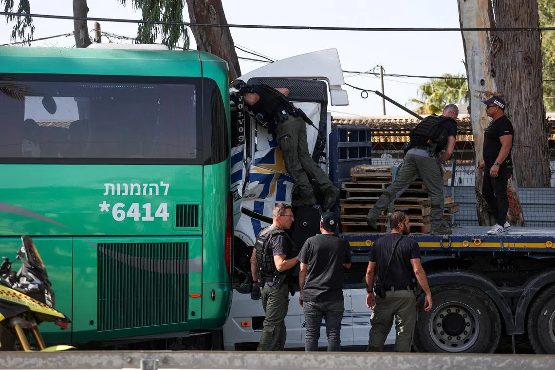 One killed, dozens injured in truck ramming at Israeli bus stop | The ...