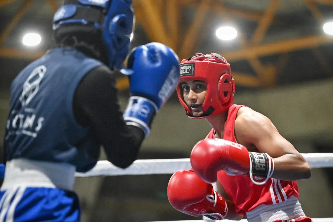 Singapore boxer Danisha Mathialagan sacrifices full-time job to focus ...