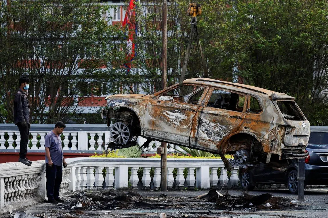 Nepal police arrest more than 400 over September protests | The Straits ...