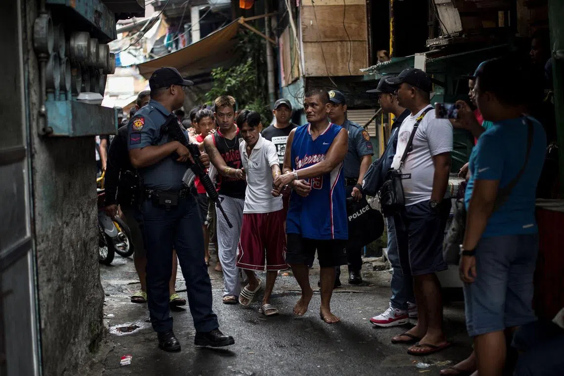 Three Philippine police officers surrender over killing of Spanish man ...