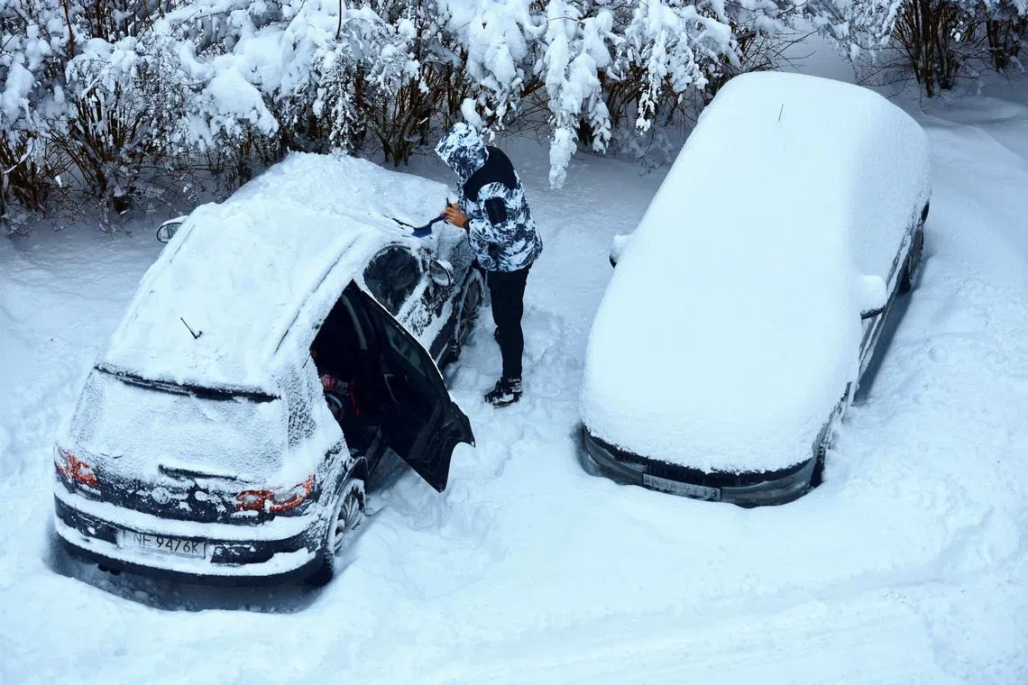 Heavy snow in Poland leaves drivers stranded in tailbacks of up to 20 ...