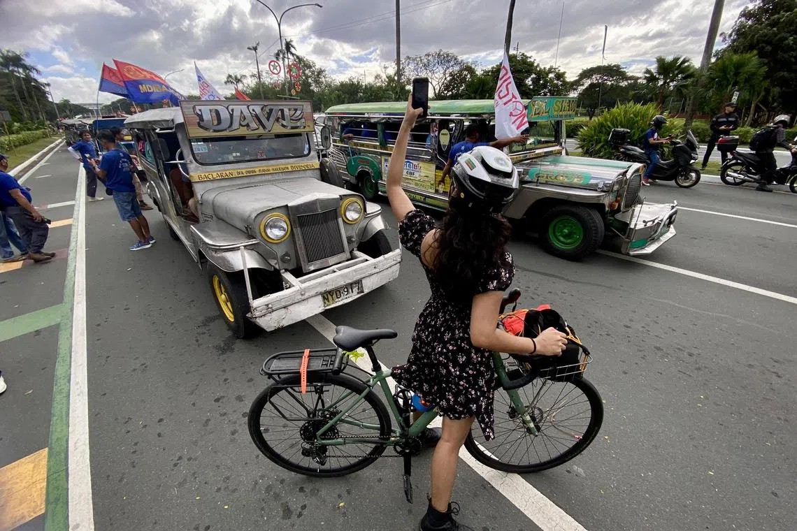 Philippine jeepney drivers on 12-day strike to protest shift to EV ...
