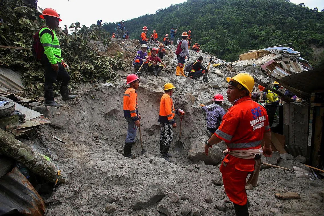 Miracle rescue of child nearly 60 hours after landslide in Philippines | The Straits Times