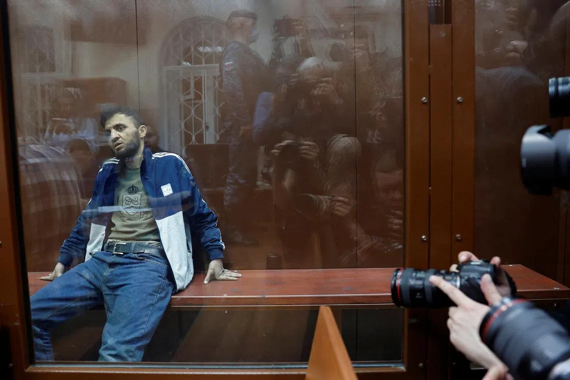 What do we know about the suspects in the Russian concert shooting ...