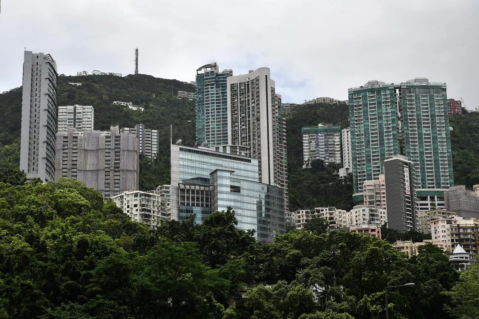 Hong Kong’s rich families sell their own homes to cut debt | The ...