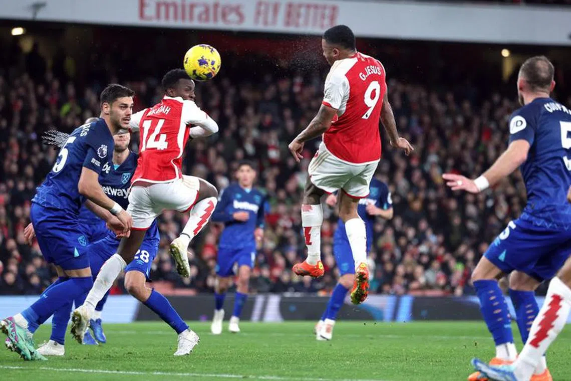 Arsenal miss out on top spot after 2-0 defeat by West Ham | The Straits ...