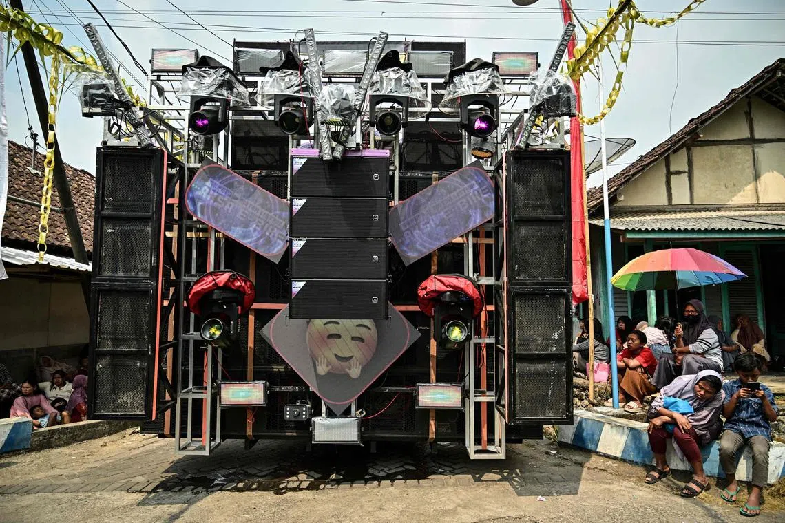Indonesia turns down ear-splitting ‘haram’ street parties | The Straits ...