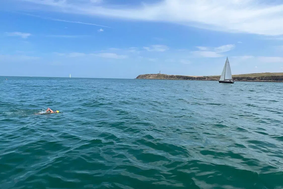 After 11hr 25min, quartet are first Singaporean relay team to swim ...